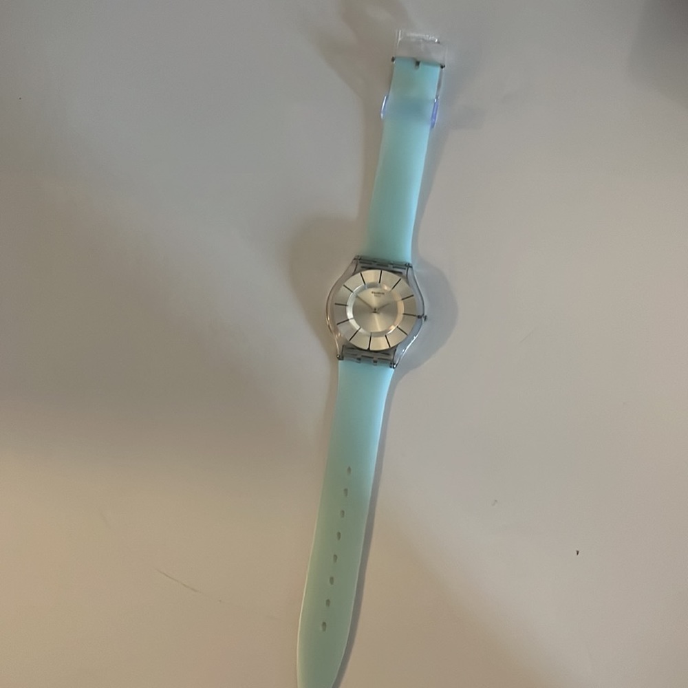 Swatch Skin Thin Light Blue Watch - Gem